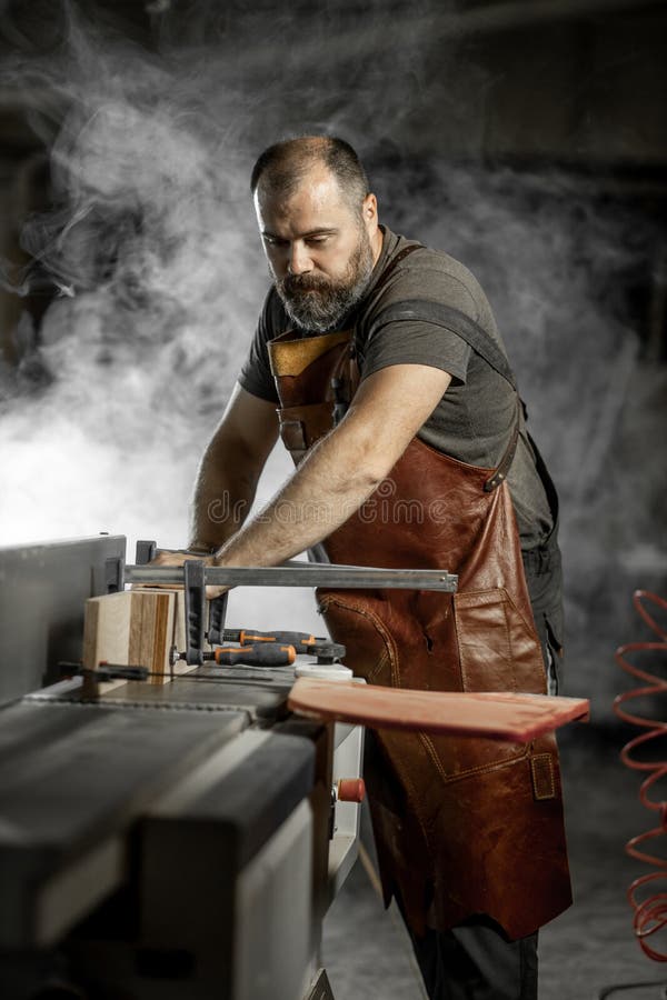Brutal Master Carpenter Saws Wood Blanks on Machine in Workshop Stock ...