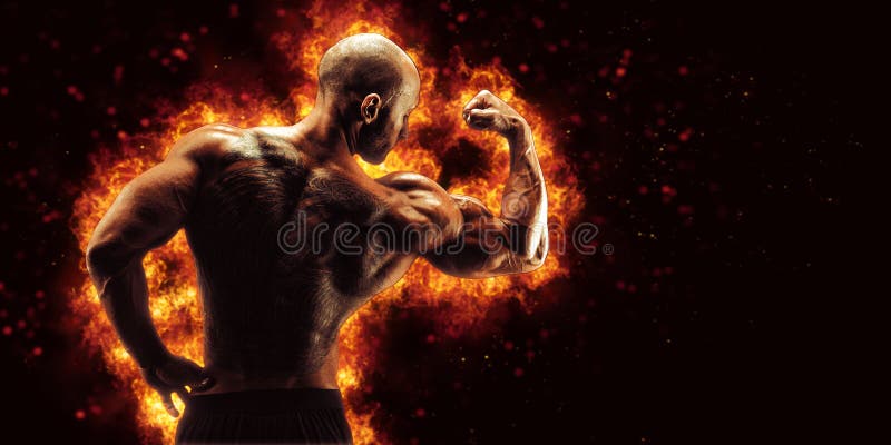 Brutal Strong Athletic Bodybuilder Posing. Fire and Spark Explosion in ...