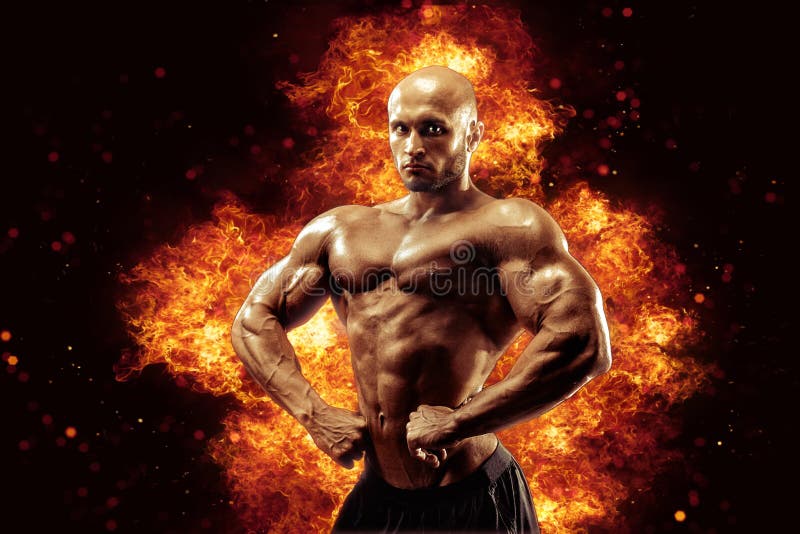 Brutal Strong Athletic Bodybuilder Posing. Fire and Spark Explosion in ...
