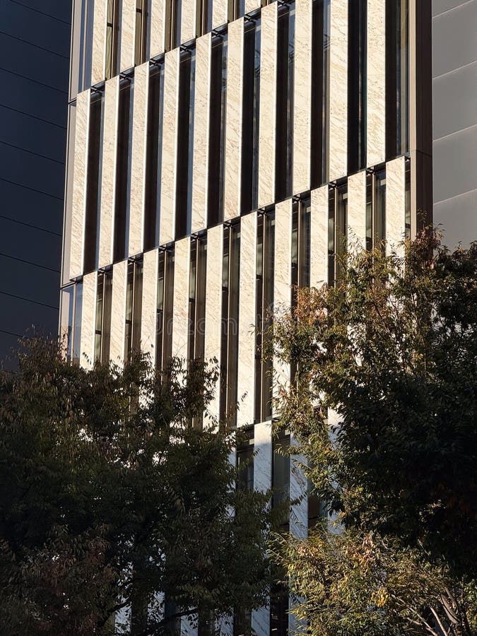 Brutalist Concrete Building with Trees in Front in Tokyo Stock Photo ...