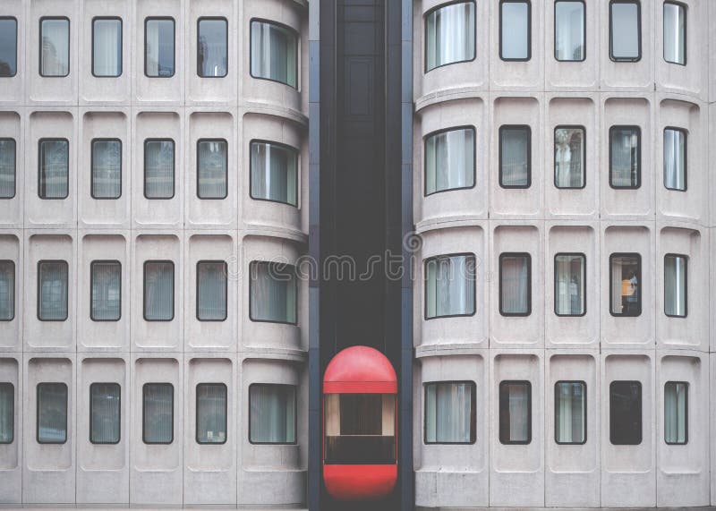 Brutalist Red Elevator stock photo. Image of architecture - 345408562