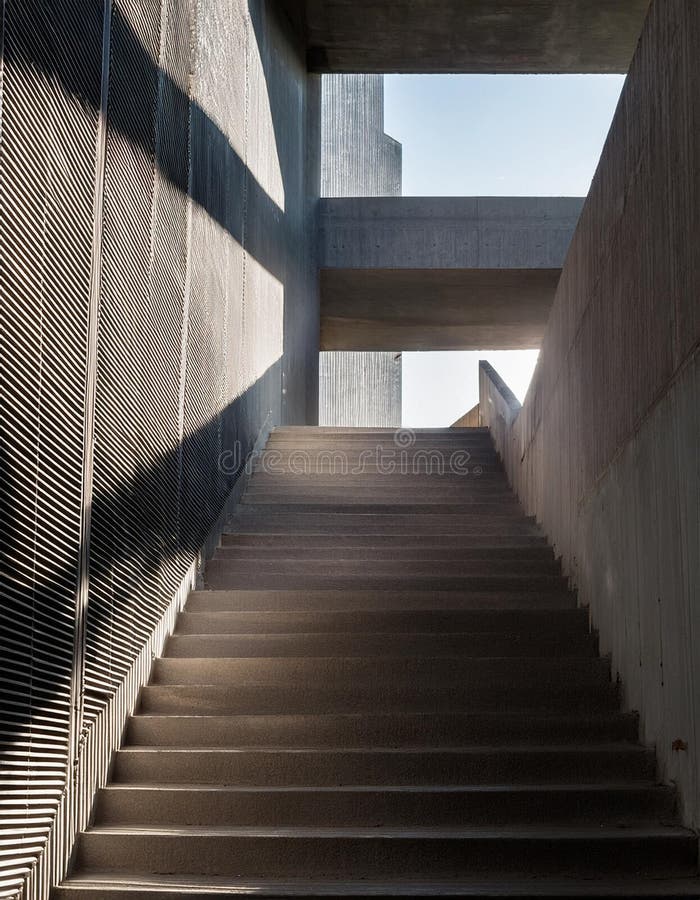 Brutalist Staircase with Light Streaming through Slats Stock Photo ...