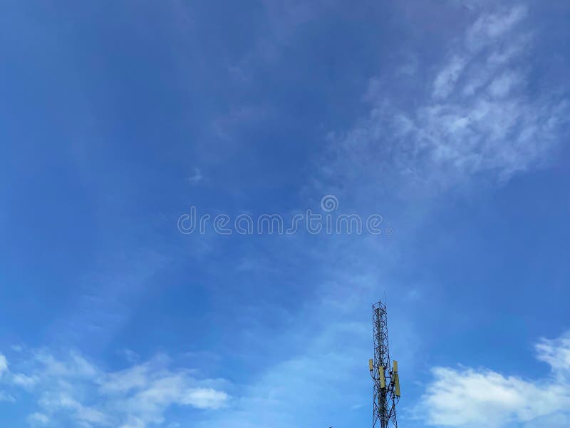The Bts or Telecommunications Tower with a Bright Blue Sky As a ...