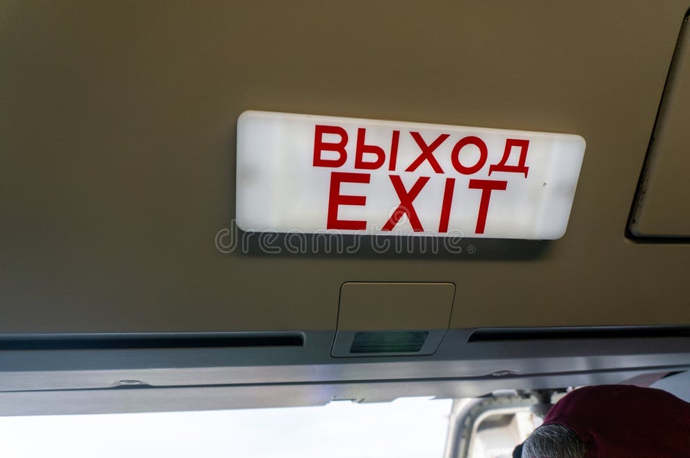 Bubble Exit Sign on Airplane Window, Emergency Exit Concept Stock Photo ...