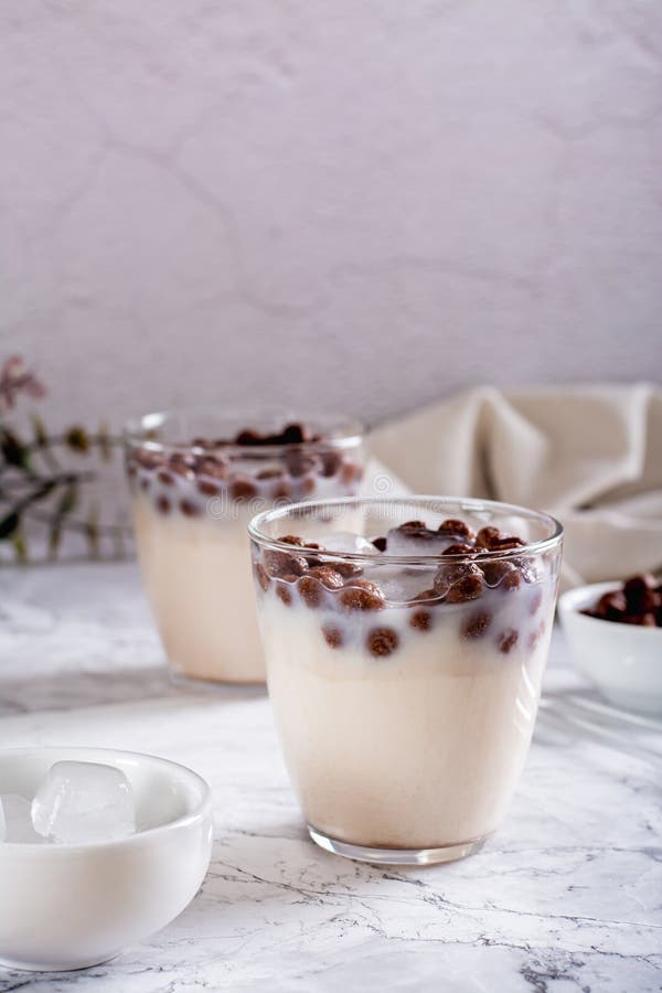 Bubble Milk Tea with Ice in Glasses on the Table Vertical View Stock ...
