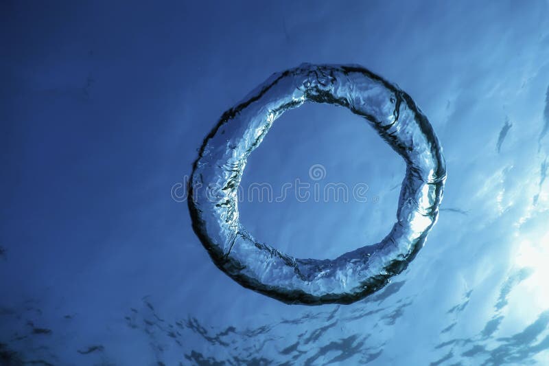 Bubble Ring Underwater Ascends Stock Photo - Image of smooth, bubbles ...