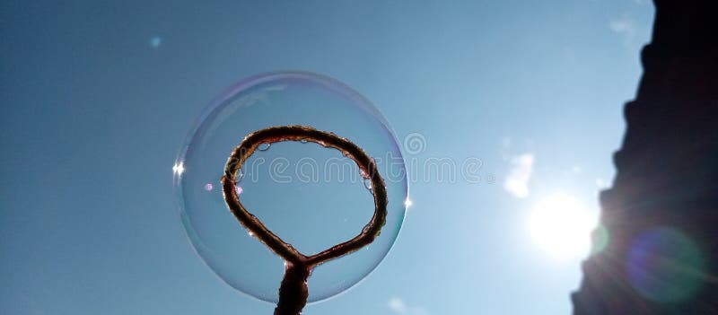 Bubble in the sunlight stock image. Image of lighting - 221562491