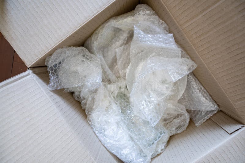 Bubble Wrap in a Cardboard Box Stock Photo - Image of protection ...
