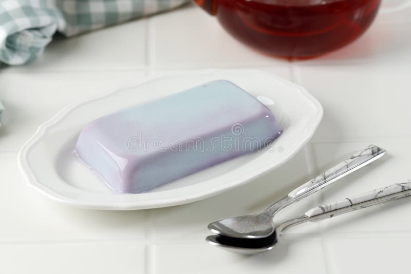 Bubblegum Pudding on White Plate. Homemade Soft Silky Pudding with Blue ...