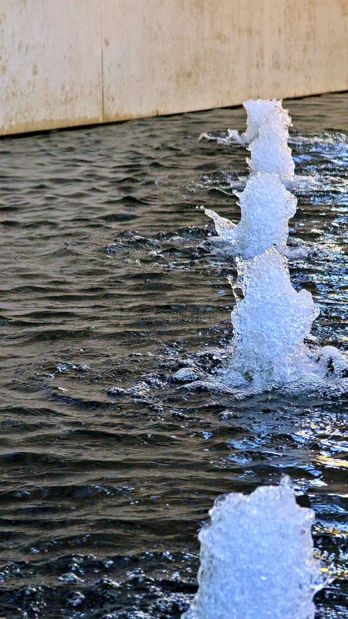 Bubblers in the Water Feature Stock Image - Image of reflection, nature ...