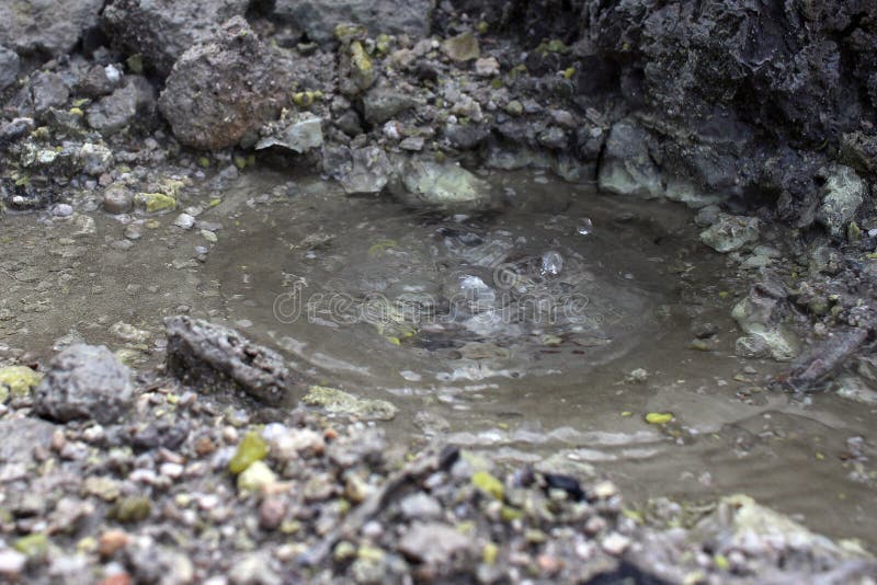 Water boils on a volcano stock image. Image of boulder - 207009075