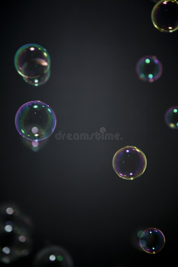 Bubbles on Dark Background stock image. Image of colored - 164021571