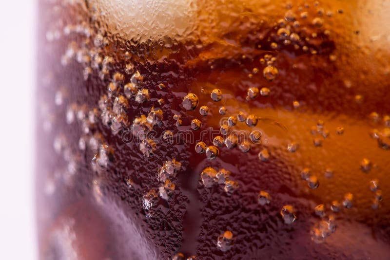 Bubbles and Fizz. a Cool Glass of Cola Drink with Ice Stock Image ...