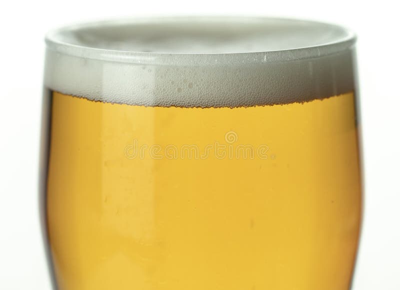 Bubbles and Foam in the Rays of Light in a Glass of Beer Close-up Stock ...
