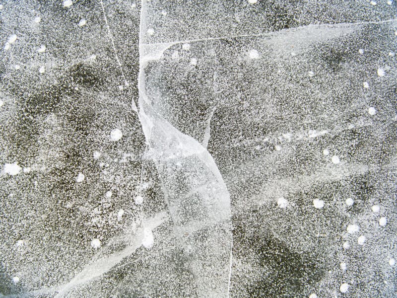 Bubbles Frozen in Thin Ice. Colorful Piece of Ice with Sun Rays ...