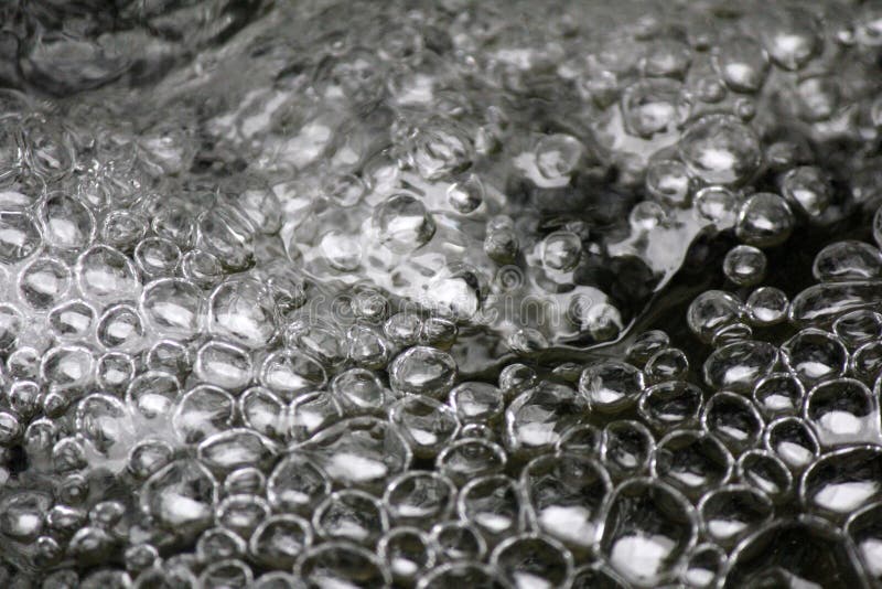 Bubbles on water stock photo. Image of horizontal, foam - 118602704