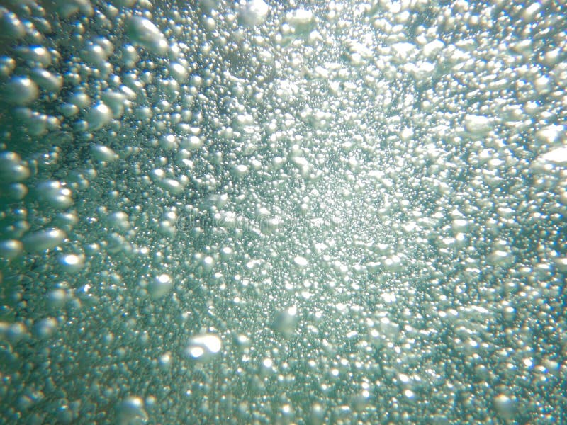 Bubbles in the Water, Viewed from Below Under a Scuba Board Stock Photo ...