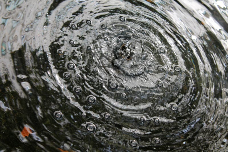 Bubbling Fountain with Concentric Ripples Stock Photo - Image of ripple ...