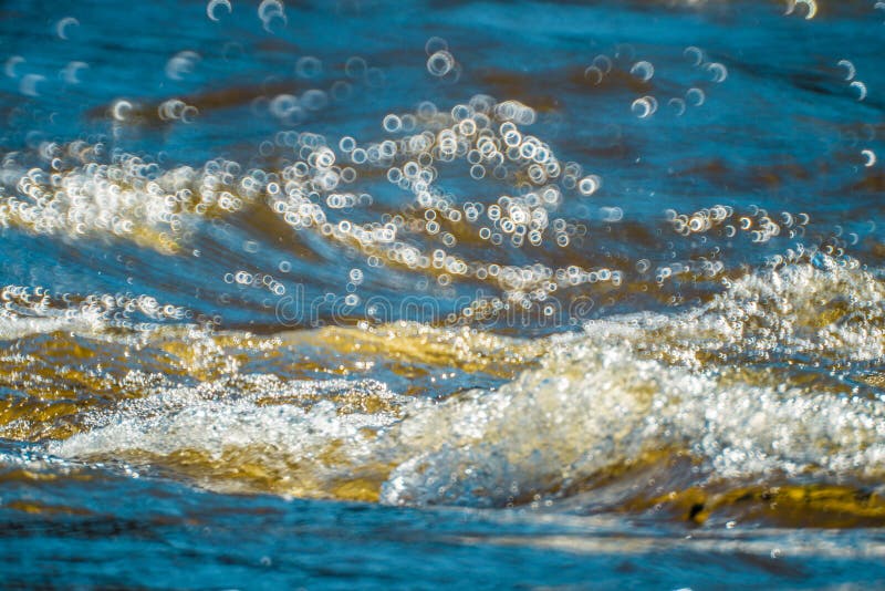 Bubbling Stream Close-up with Sparkling Highlights and Dynamic Water ...