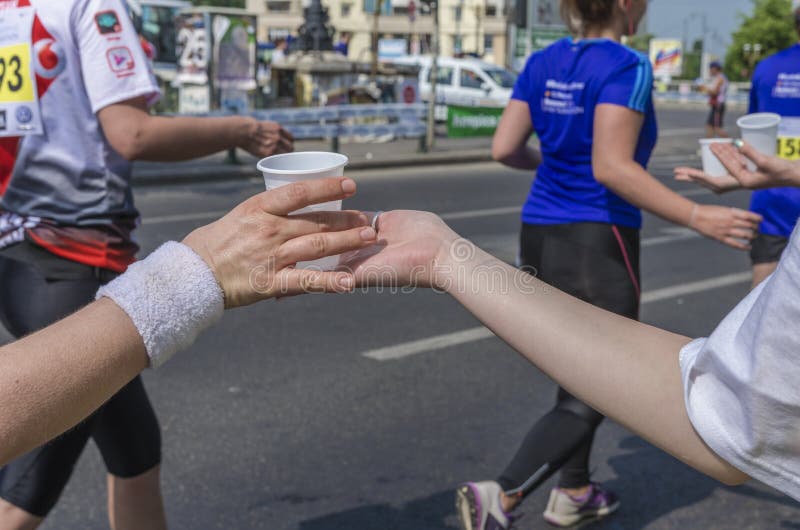 Race Refreshment editorial photography. Image of holding - 54286922