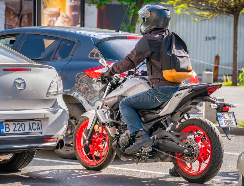 Biker on a Motorcycle in Traffic at the Stoplight Editorial Stock Photo ...