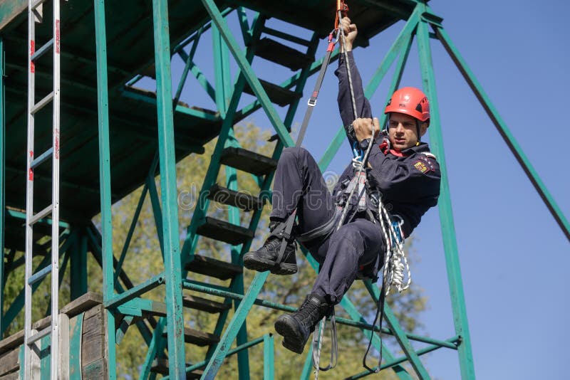 Firefighters are Rappelling and Climbing Ropes Editorial Photo - Image ...