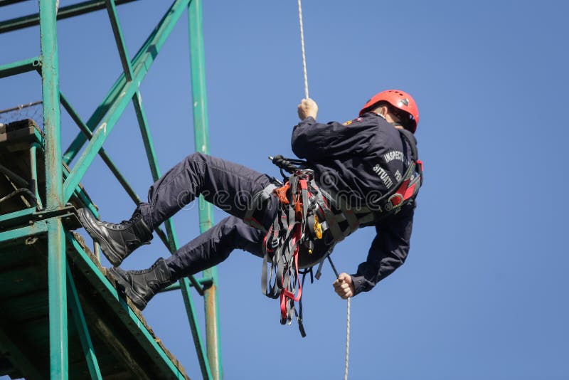 Firefighters are Rappelling and Climbing Ropes Editorial Image - Image ...