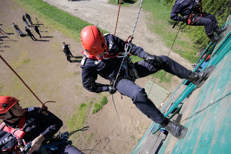 Firefighters are Rappelling and Climbing Ropes Editorial Stock Image ...