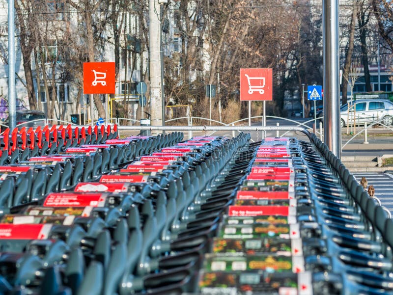 Many Aligned Shopping Carts at the Hypermarket Editorial Stock Image ...