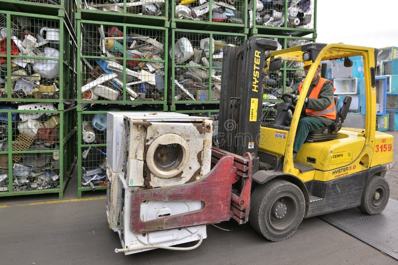 Bucharest, Romania - October 2013: Worker Moving Electronic Waste from ...