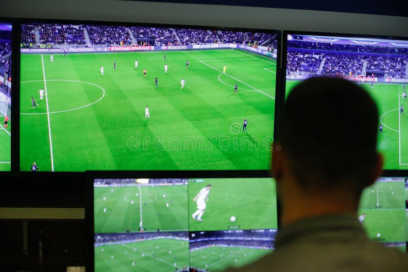A Referee is Showing To the Press How the Video Assistant Referee VAR ...