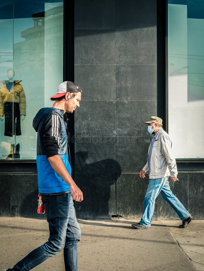 Two People Walking Opposite Directions Person Middle Stock Photos ...