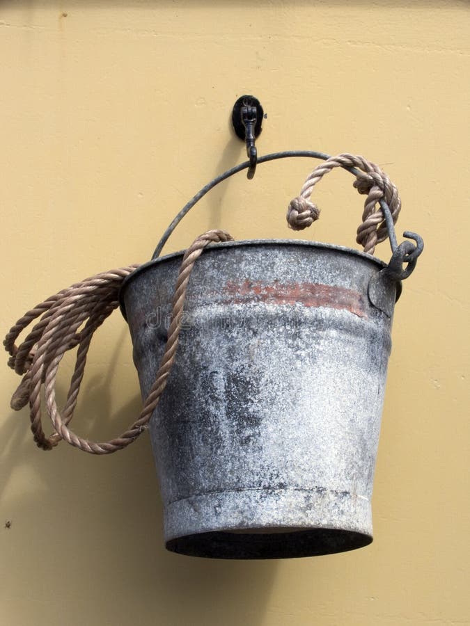 Leaky Bucket stock image. Image of waste, running, holes - 5839431