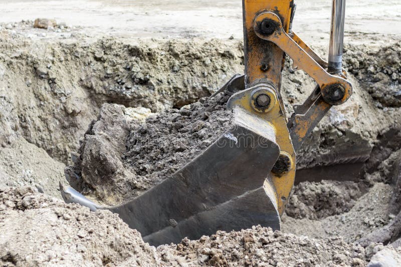 Bucket of a Backhoe Loader Digging Ground Closeup Stock Photo - Image ...