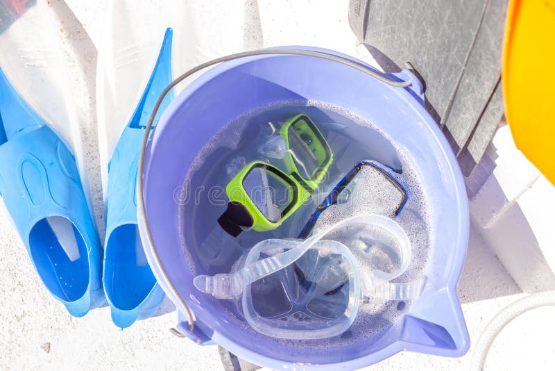 Bucket with diving masks stock photo. Image of equipment - 84300748