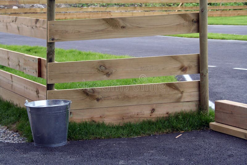 Bucket fence stock image. Image of green, bucket, asphalt - 4677051