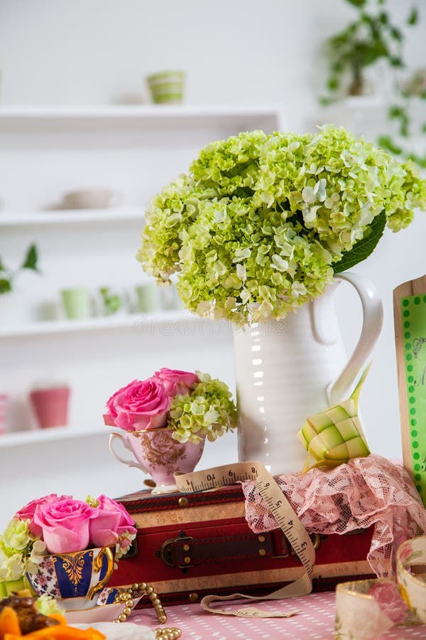 Bucket of Flowers Displayed at the Table Setting Idea Stock Photo ... Bucket of Flowers Displayed at the Table Setting Idea Stock Photo ...