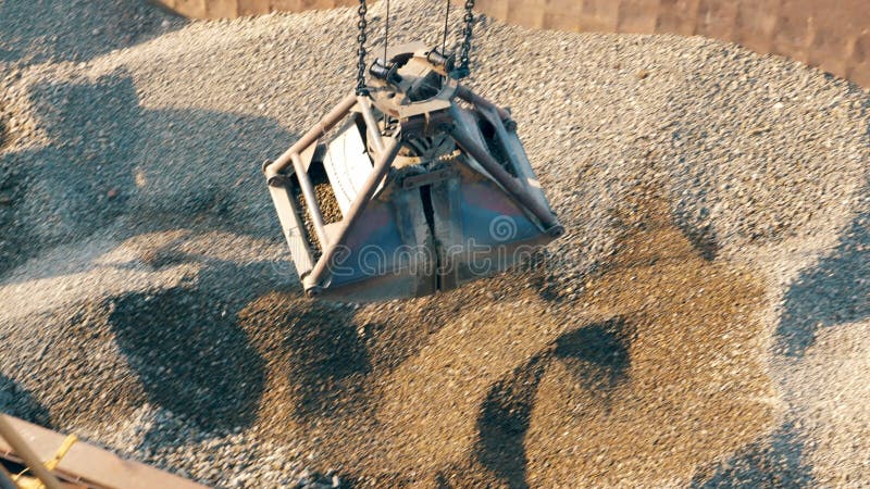 Bucket of a Loading Machine is Grabbing and Relocating Rubble Stock ...