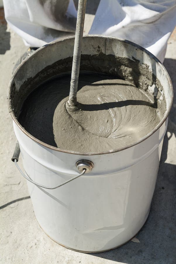 Bucket with Mixing of Adhesive on Construction Site Stock Image - Image ...