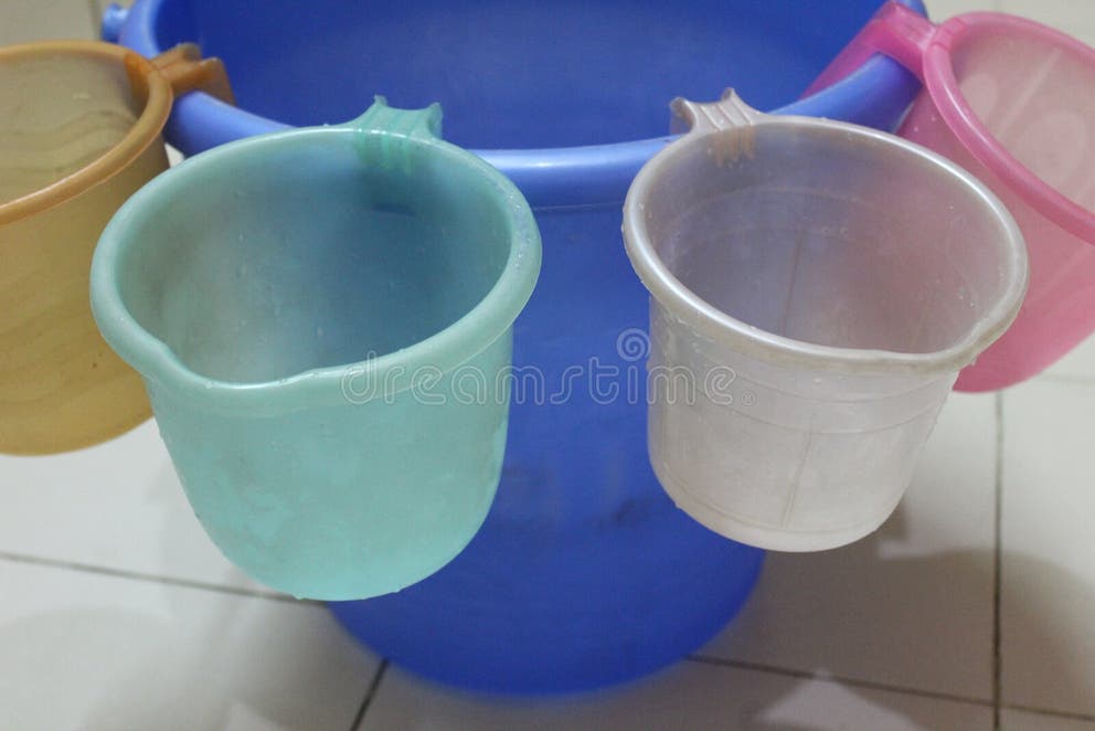 Bucket and mugs stock image. Image of pink, product, mugs - 95558577