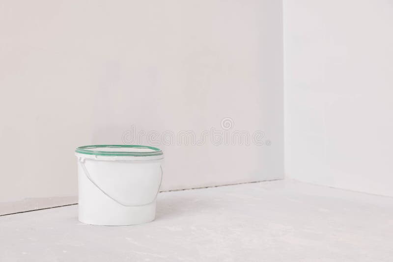 Bucket with Paint in Empty Room, Space for Text Stock Image - Image of ...
