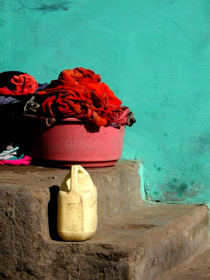 Bucket of Poverty stock image. Image of color, house, beautiful - 1519793
