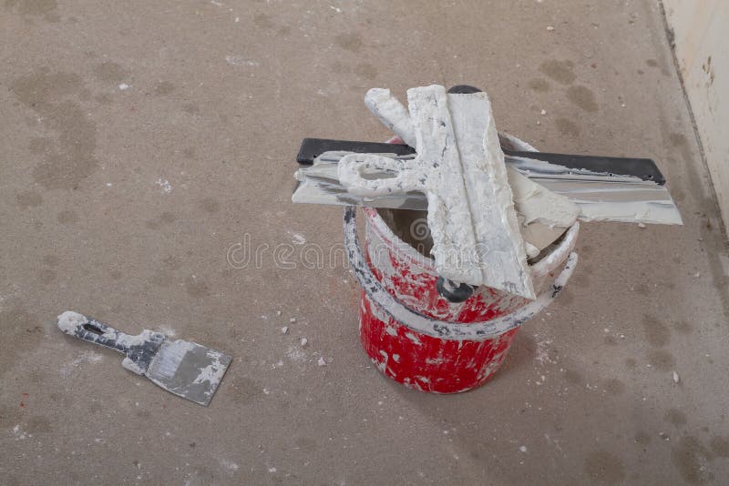 Bucket with Putty and Spatula for Wall Putty Stock Image - Image of ...