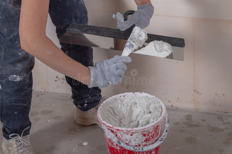 Bucket with Putty and Spatula for Wall Putty Stock Photo - Image of ...