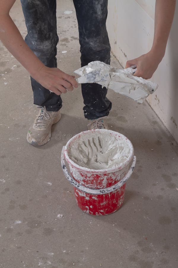 Bucket with Putty and Spatula for Wall Putty Stock Image - Image of ...