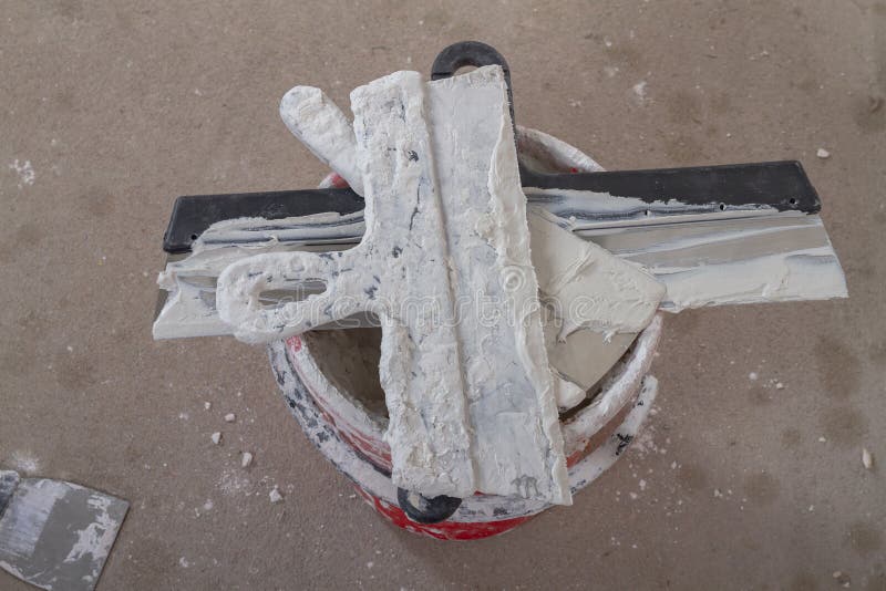 Bucket with Putty and Spatula for Wall Putty Stock Photo - Image of ...