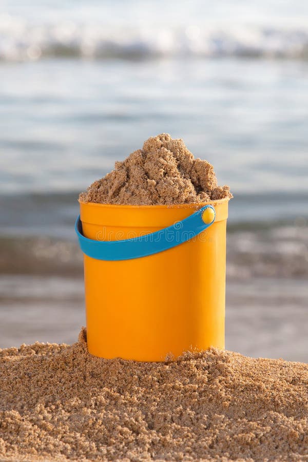 Bucket of sand stock photo. Image of yellow, beaches - 45403696