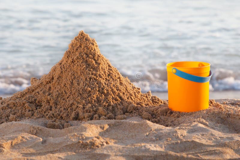 Bucket and the sand stock photo. Image of sandy, outdoor - 45403746