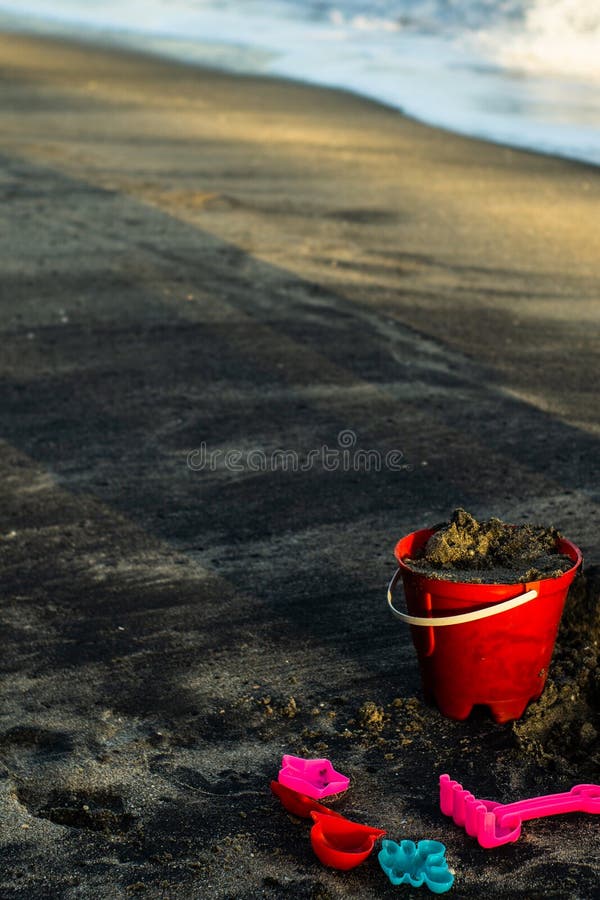 Bucket in a Dark Sand Closer To the Sea Stock Image - Image of ...