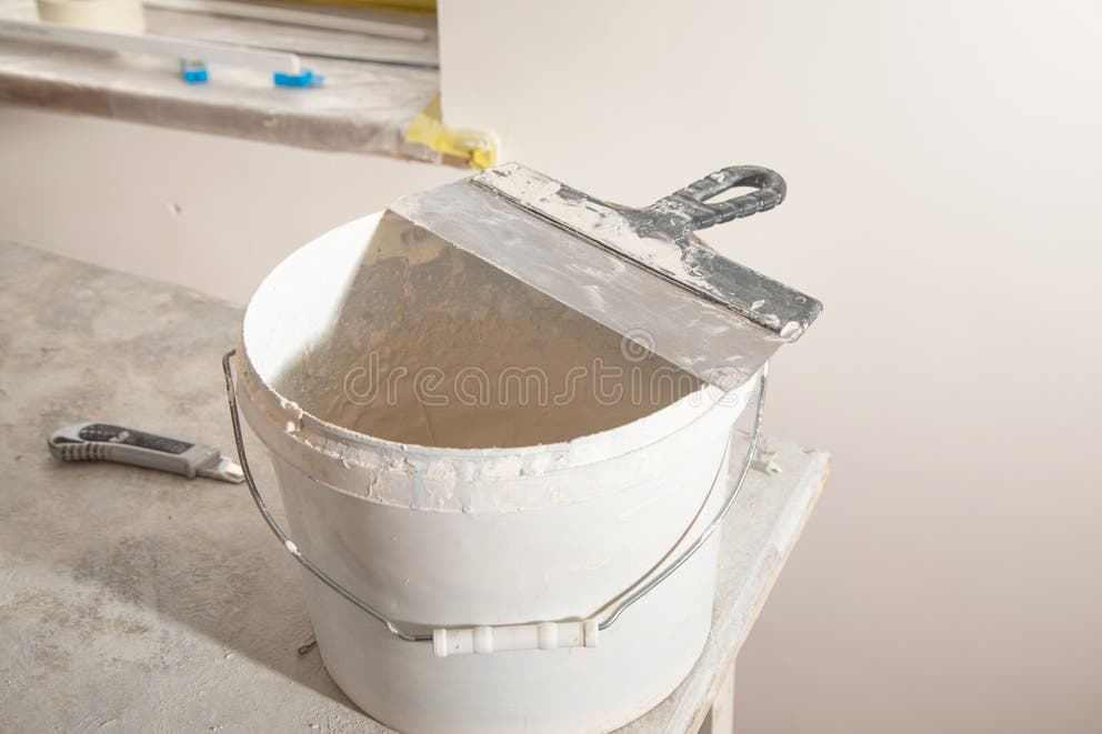 Bucket with a Spatula for Leveling Stock Image - Image of home, object ...